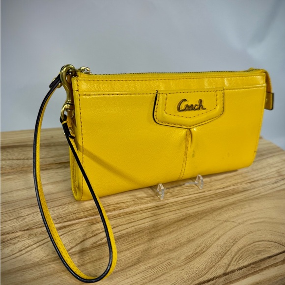 Coach | Bags | Coach Ashley Yellow Leather Wristlet | Poshmark